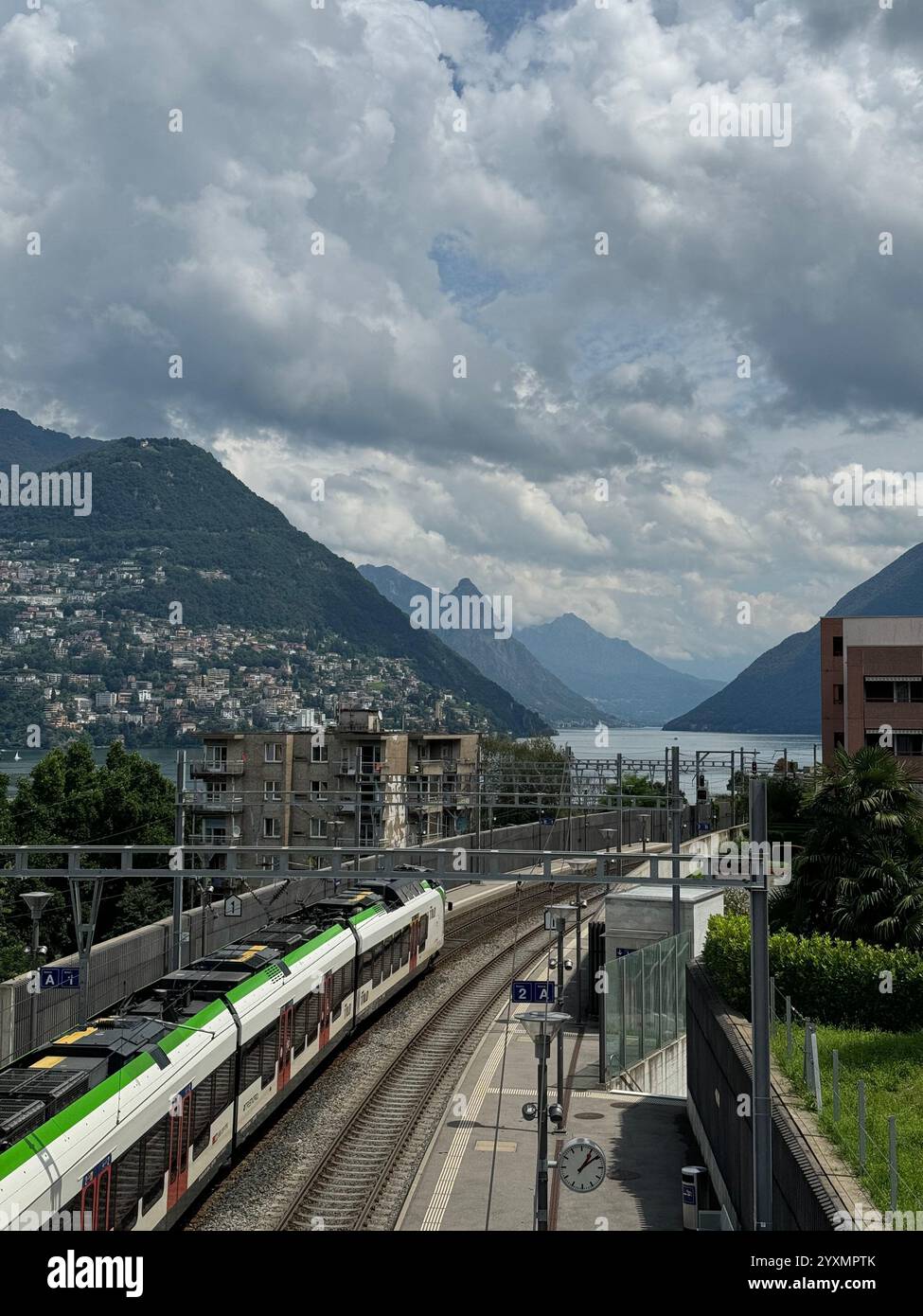 Panorama lake lugano on cloudy hi-res stock photography and images - Alamy