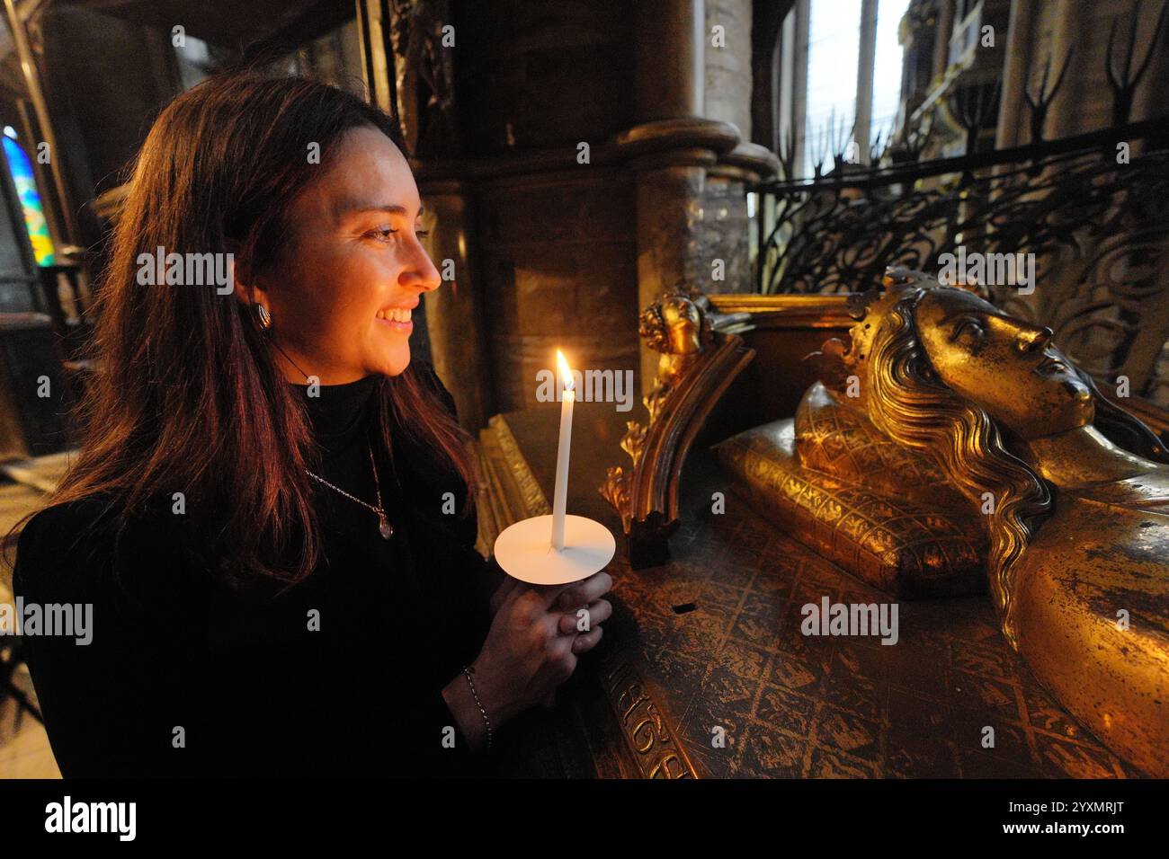 Historian Alice Loxton places a candle on the tomb of Eleanor of ...