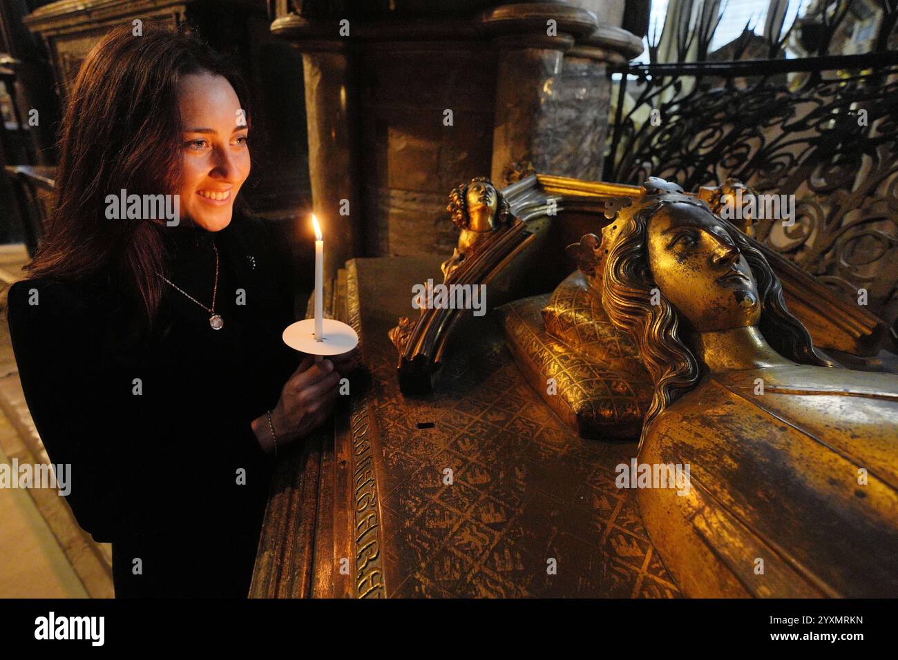 Historian Alice Loxton places a candle on the tomb of Eleanor of ...