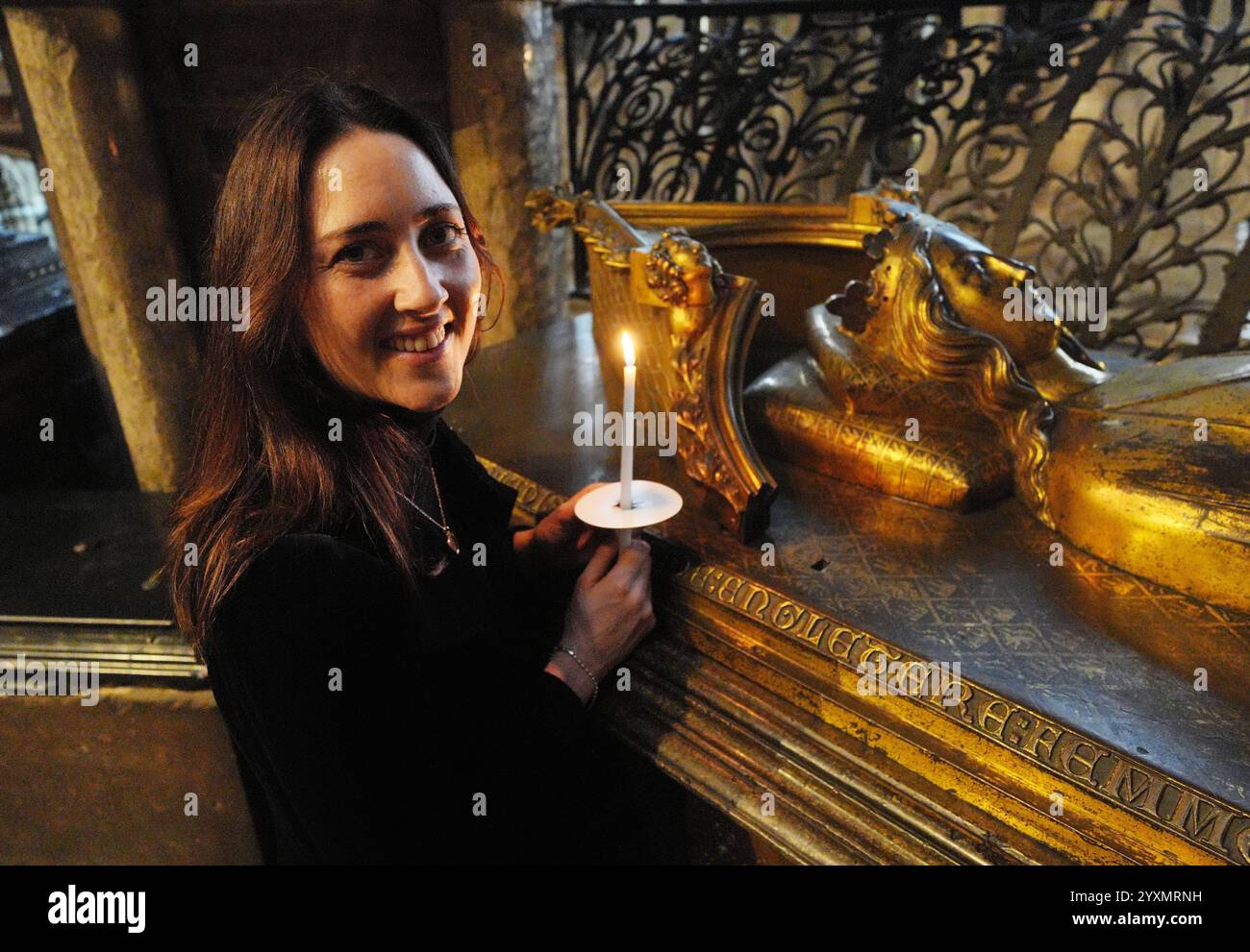 Historian Alice Loxton places a candle on the tomb of Eleanor of ...