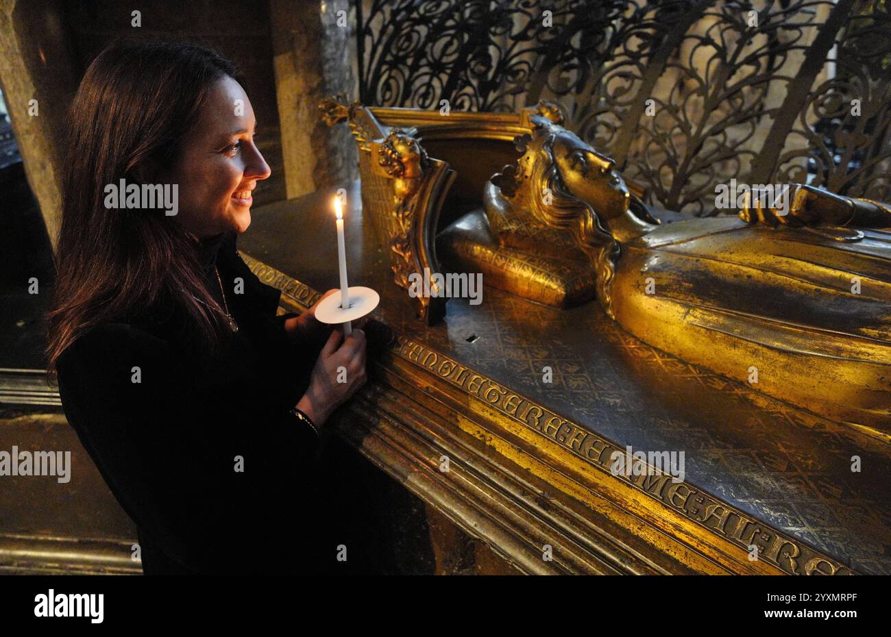 Historian Alice Loxton places a candle on the tomb of Eleanor of ...