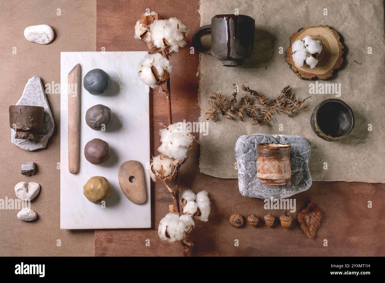 Flat lay of creative design beige pottery mood board. Balls of ...