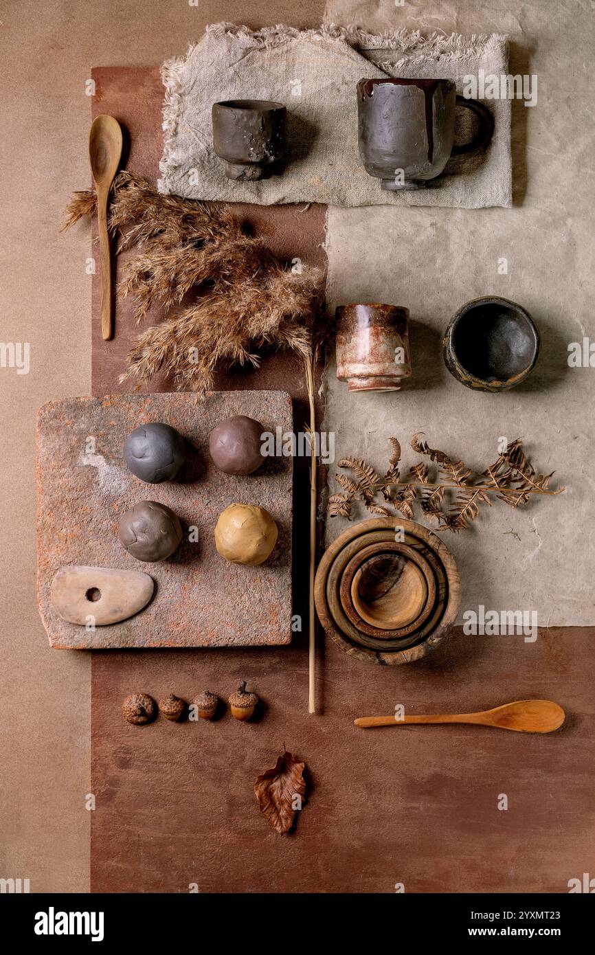 Flat lay of creative design beige pottery mood board. Balls of ...