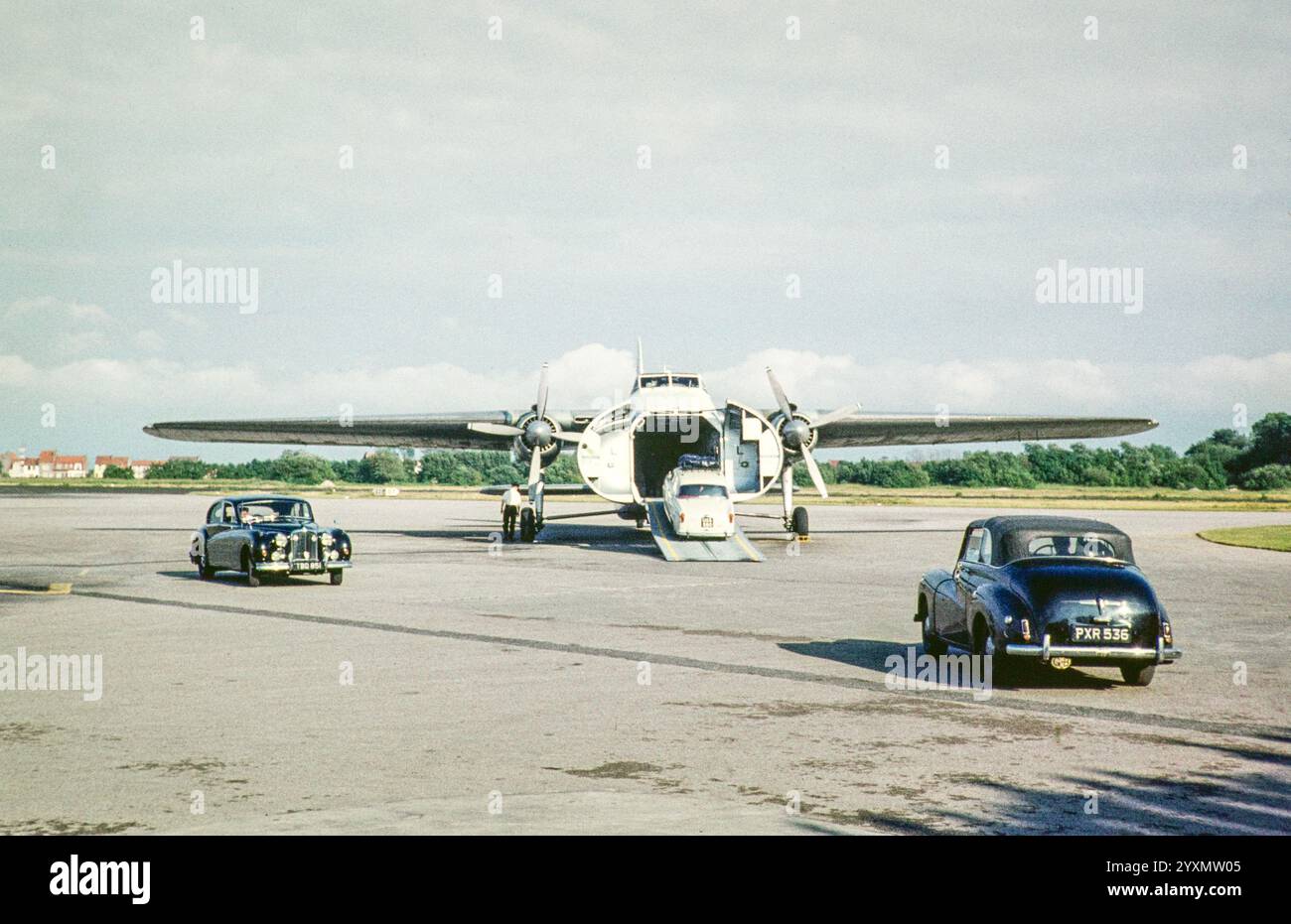 Car loaded onto plane hi-res stock photography and images - Alamy