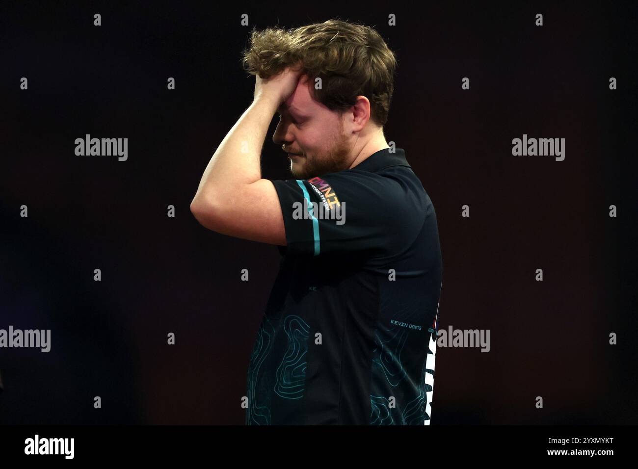 Kevin Doets reacts in their first round match against Noa-Lynn van ...