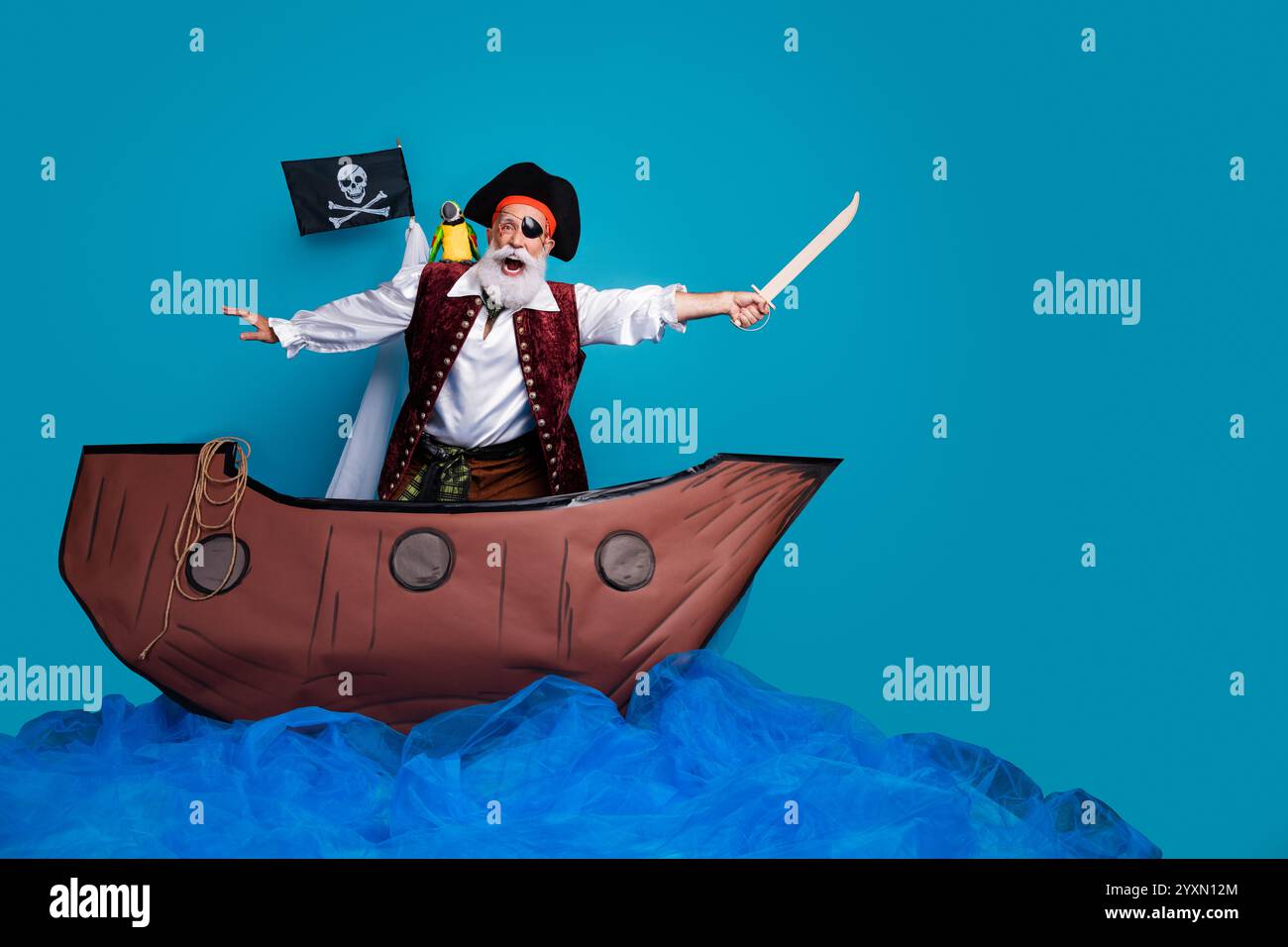 Photo of senior man wearing traditional costume swimming pirate ship ...