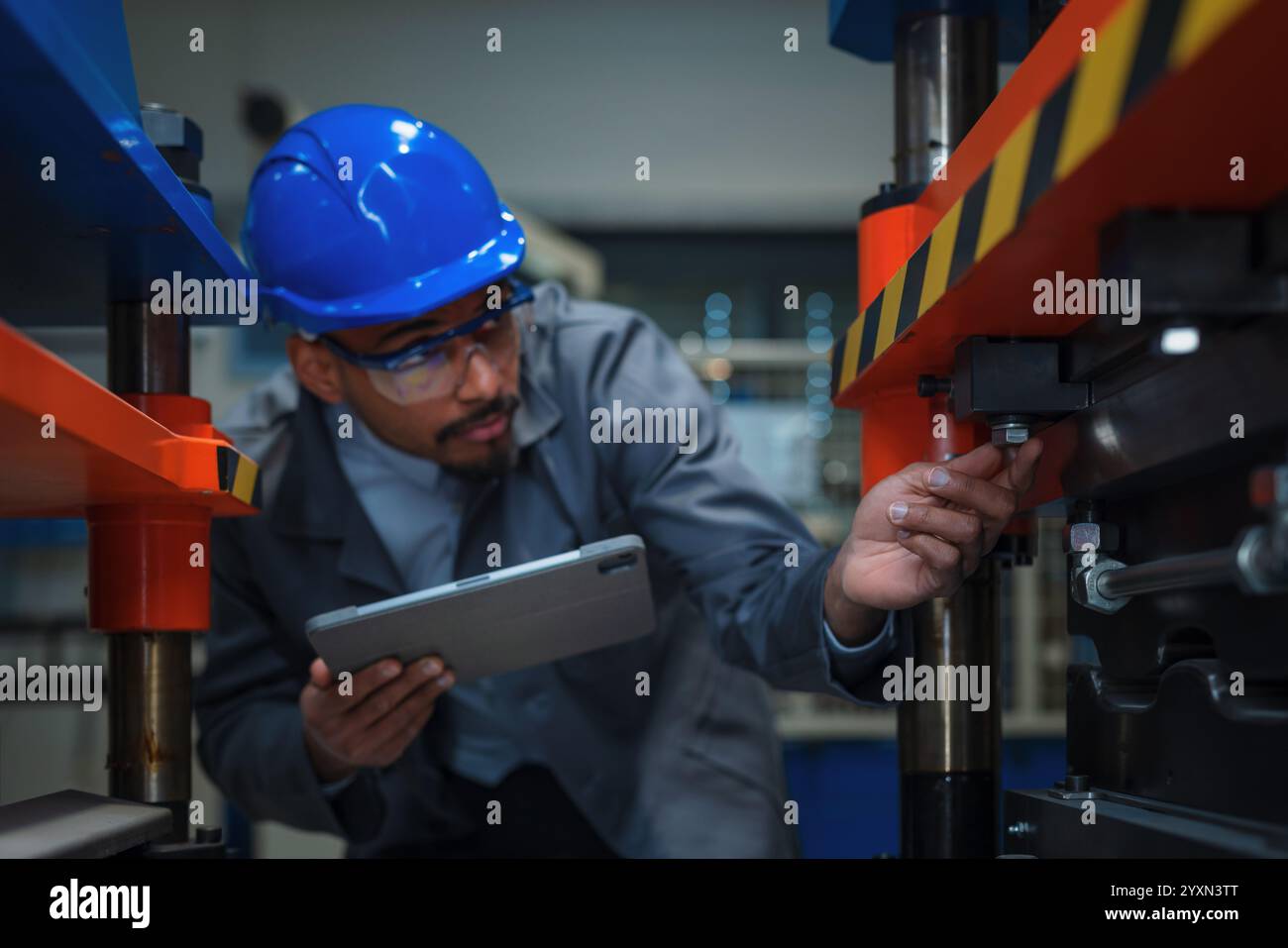 Engineer check control heavy machinery in Industrial factory for ...