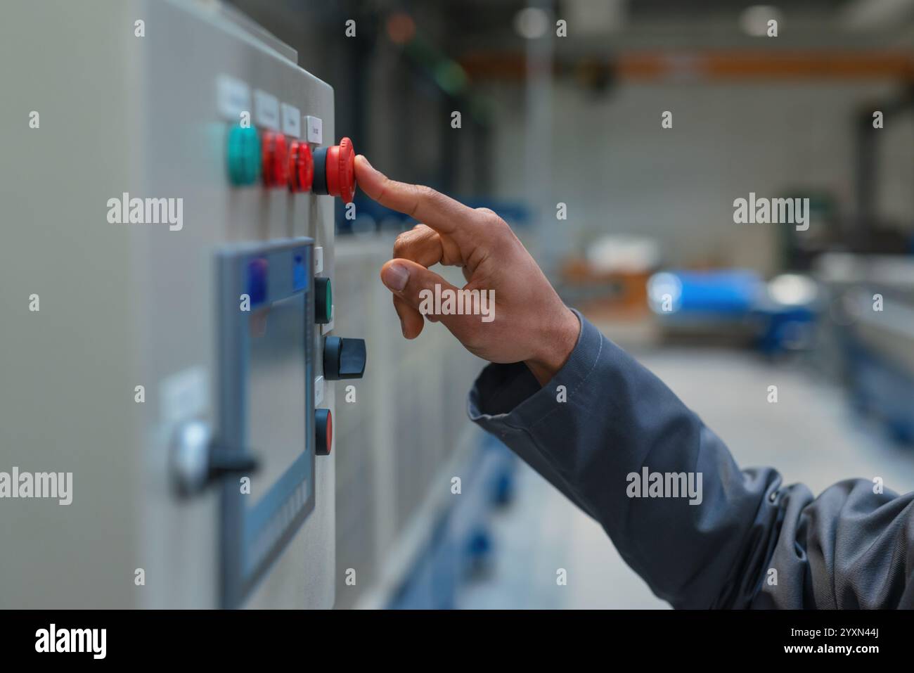 African American engineer with a blue helmet and safety goggles ...