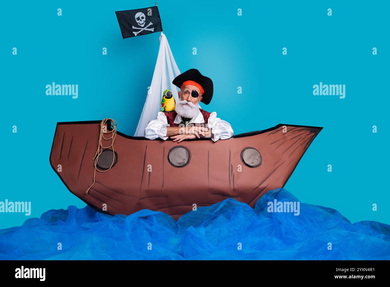 Photo of old man sea robber wearing traditional pirate costume sitting ...
