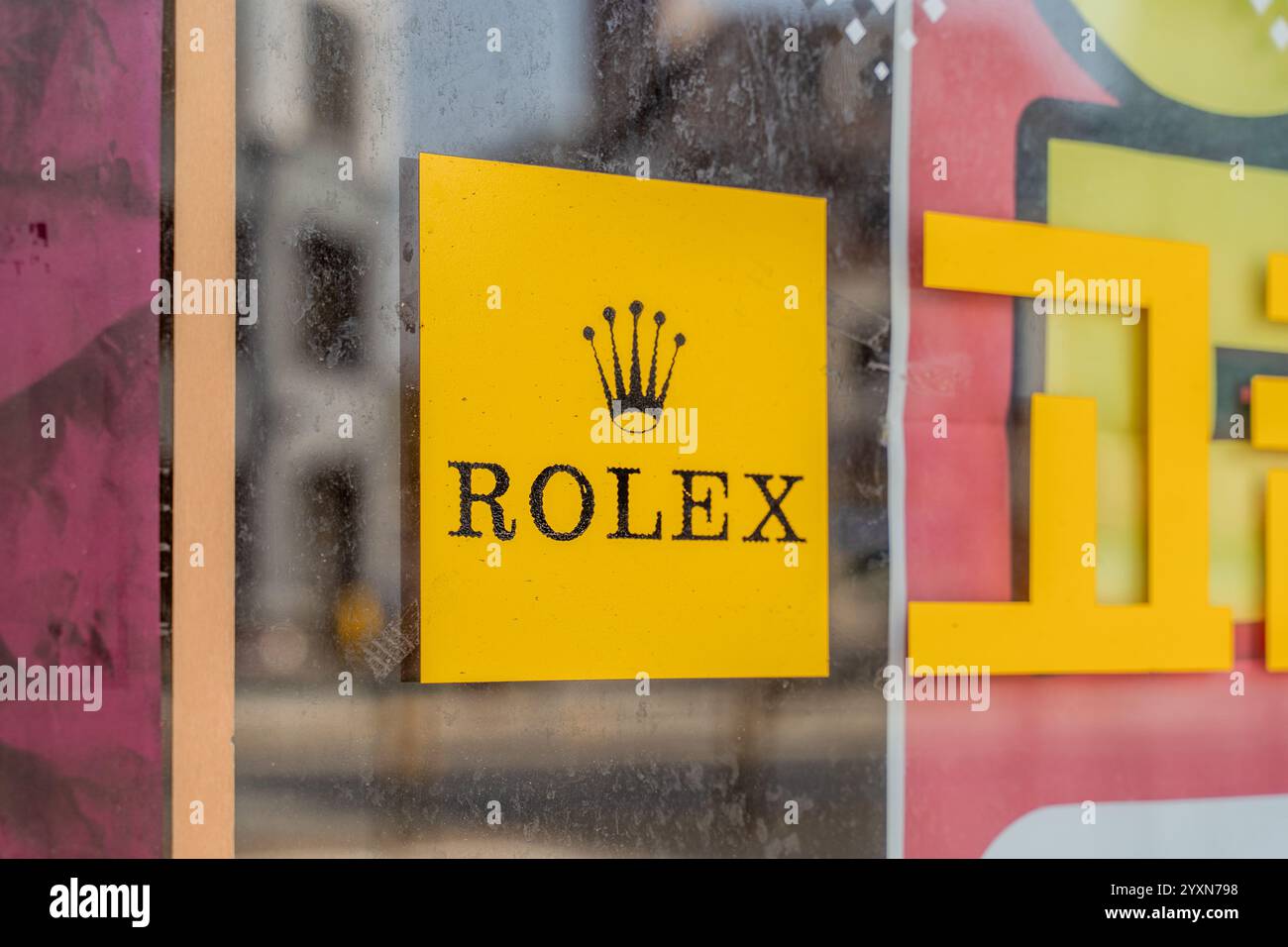 A Rolex storefront display featuring luxury watches Stock Photo - Alamy