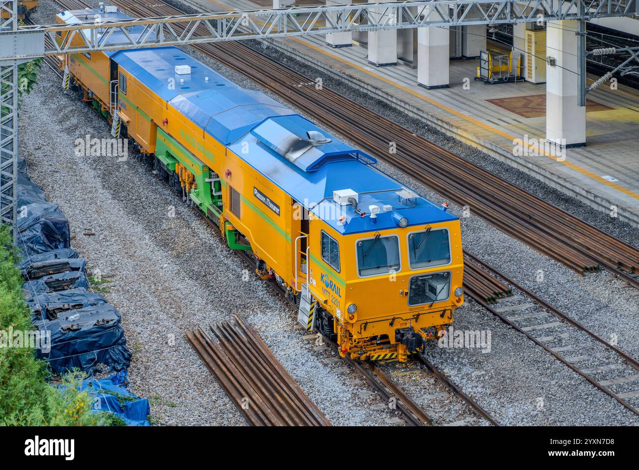 A train waiting for towing at the station Stock Photo - Alamy