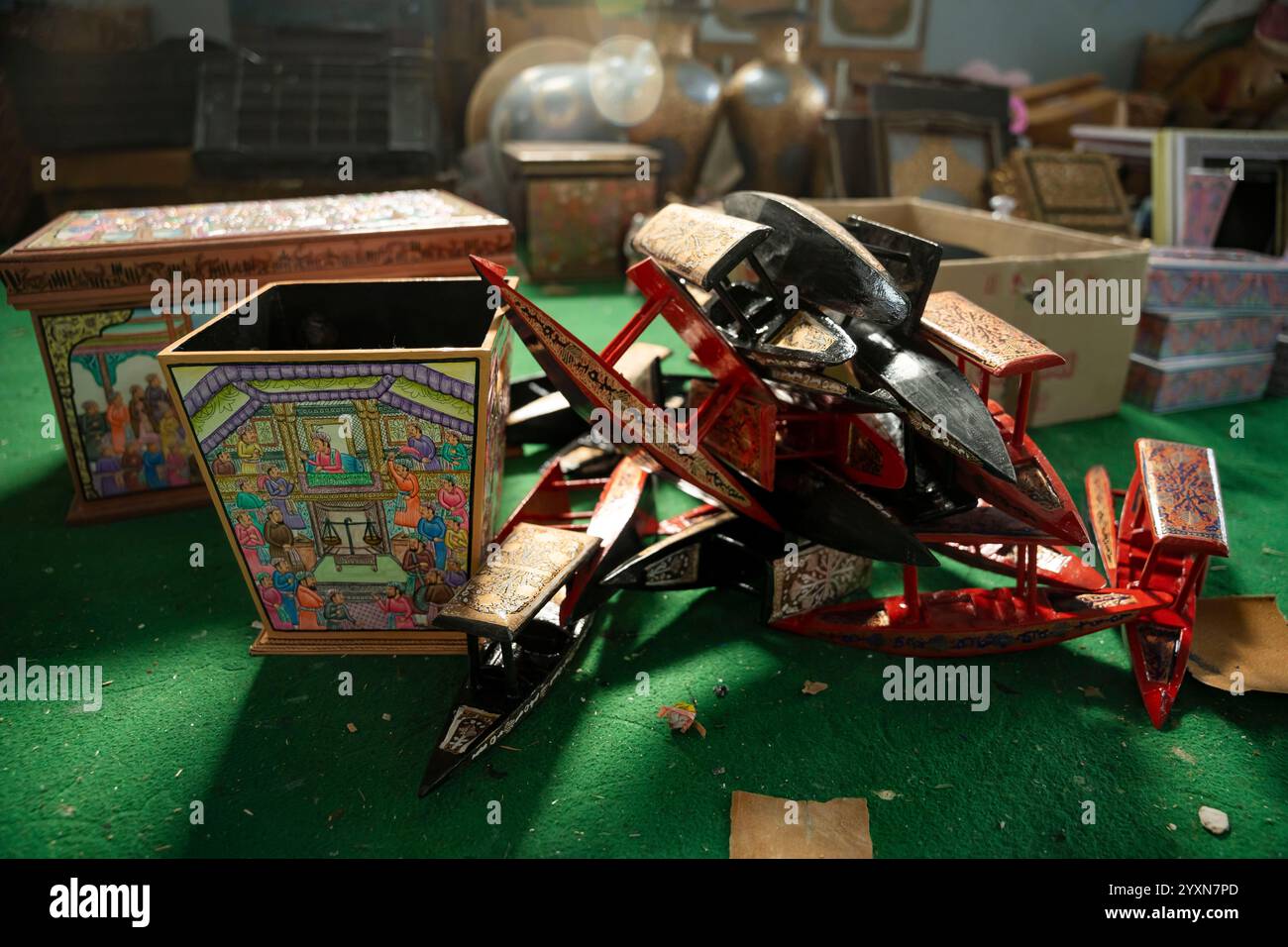 Decorative paper-mache items are displayed inside a showroom ahead of ...
