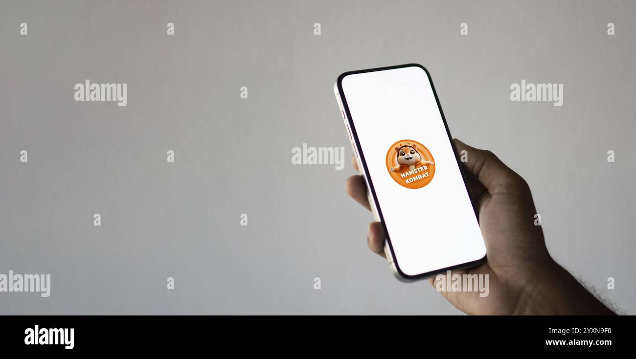 Hamster Kombat telegram bot on smartphone screen. Hamster Kombat is a ...