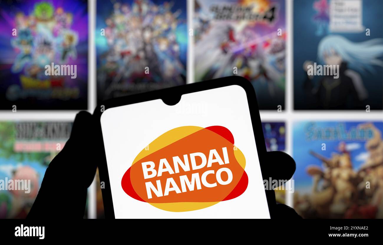 Bandai Namco logo is displayed on smartphone. Bandai Namco ...