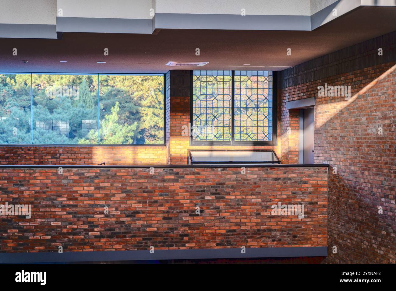 Sunlight streams into the lobby of Onyang Folk Museum in Asan, creating ...