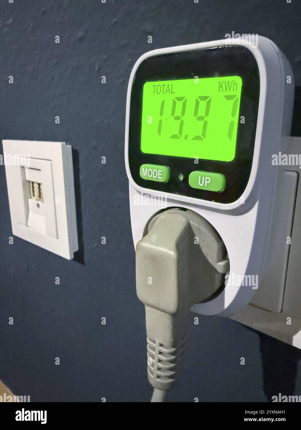 Measuring device for power consumption with display Stock Photo - Alamy