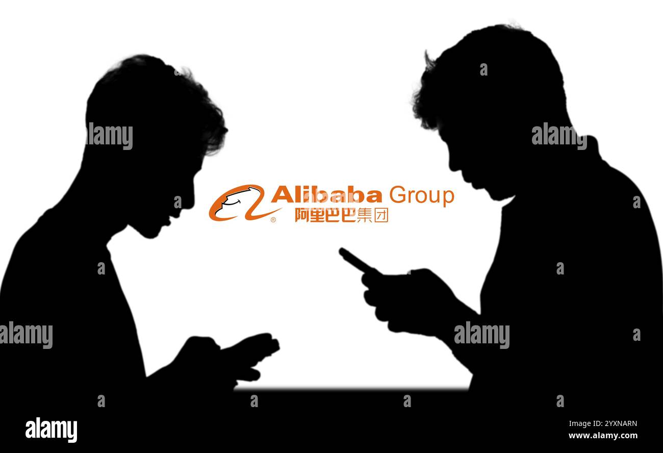 Alibaba logo on the screen smartphone. Alibaba Group Holding Limited is ...