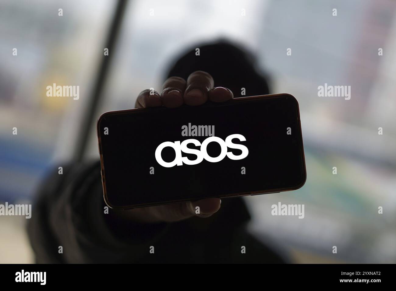 Dhaka, Bangladesh 14 Dec 2024:Cellphone with logo of British fashion ...