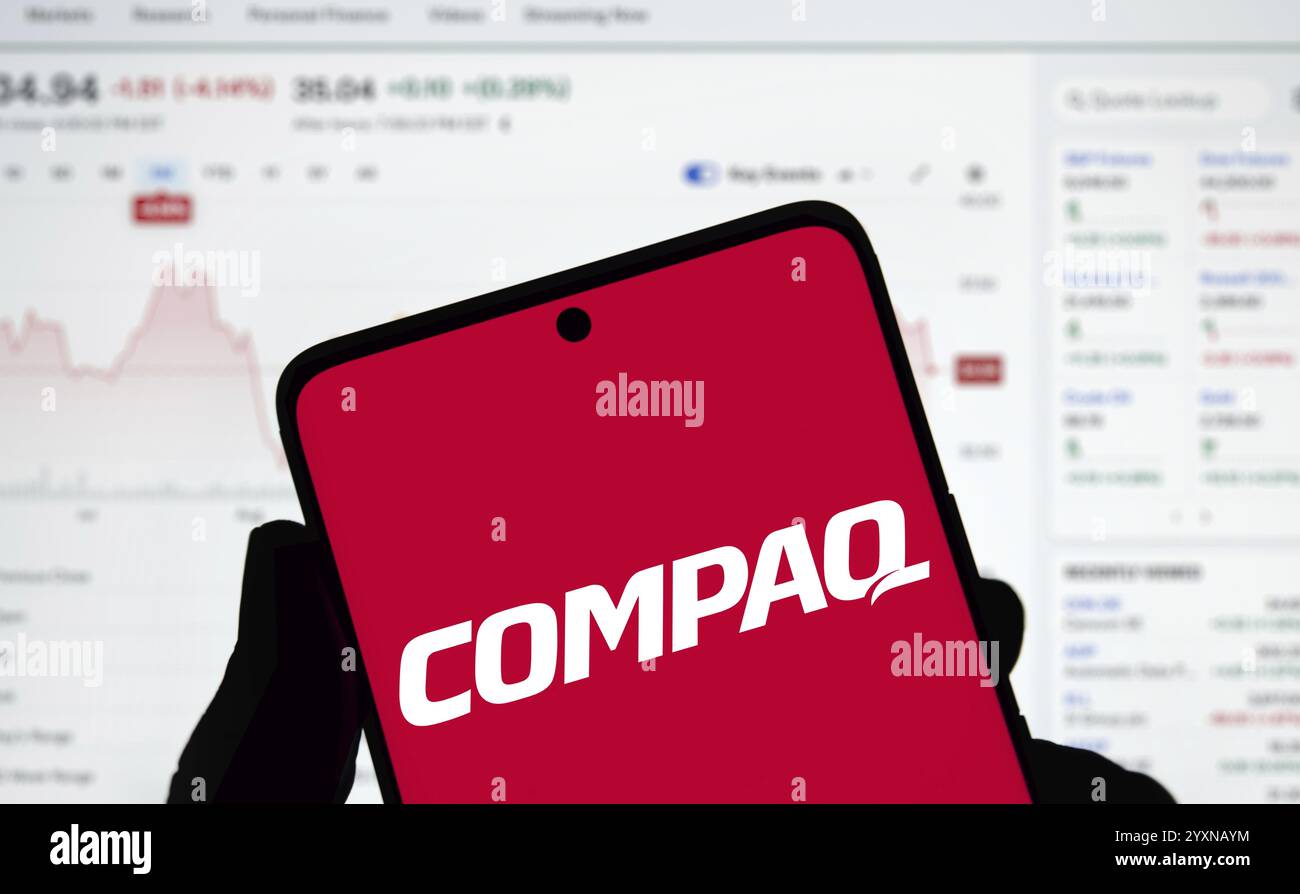 Dhaka, Bangladesh- 11 Dec 2024: COMPAQ logo is displayed on smartphone ...