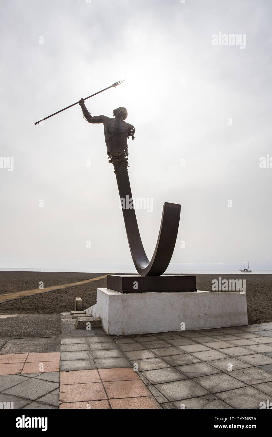 Artwork on the beach, water god with trident on the beach of Gran ...