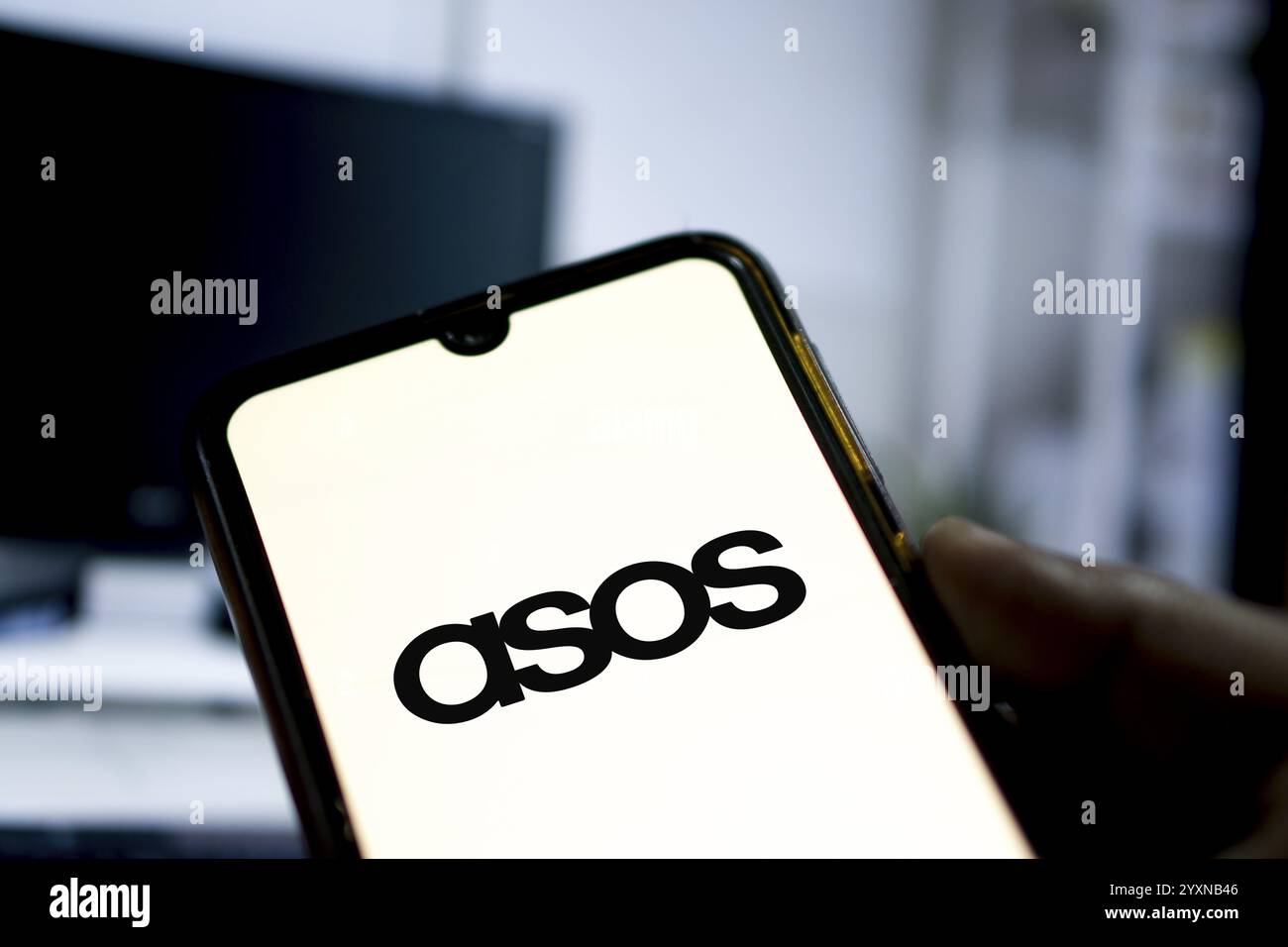 Dhaka, Bangladesh 14 Dec 2024:Cellphone with logo of British fashion ...