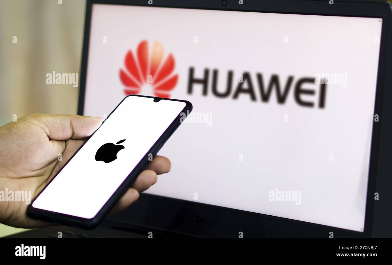 Huawei vs Apple logo on a smartphone Stock Photo - Alamy