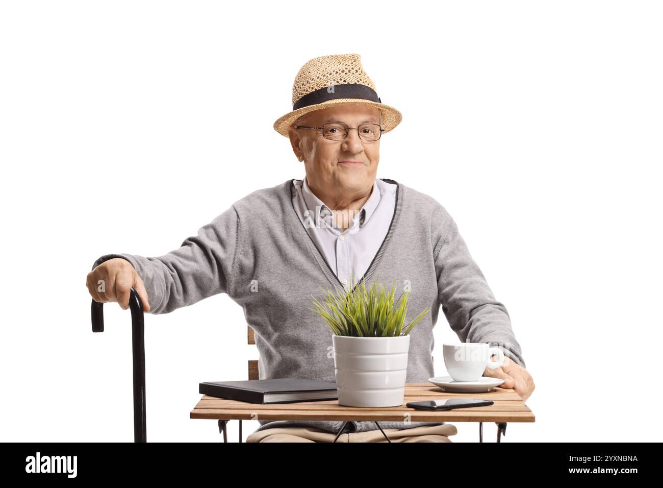 Mature man sitting chair behind table hi-res stock photography and ...