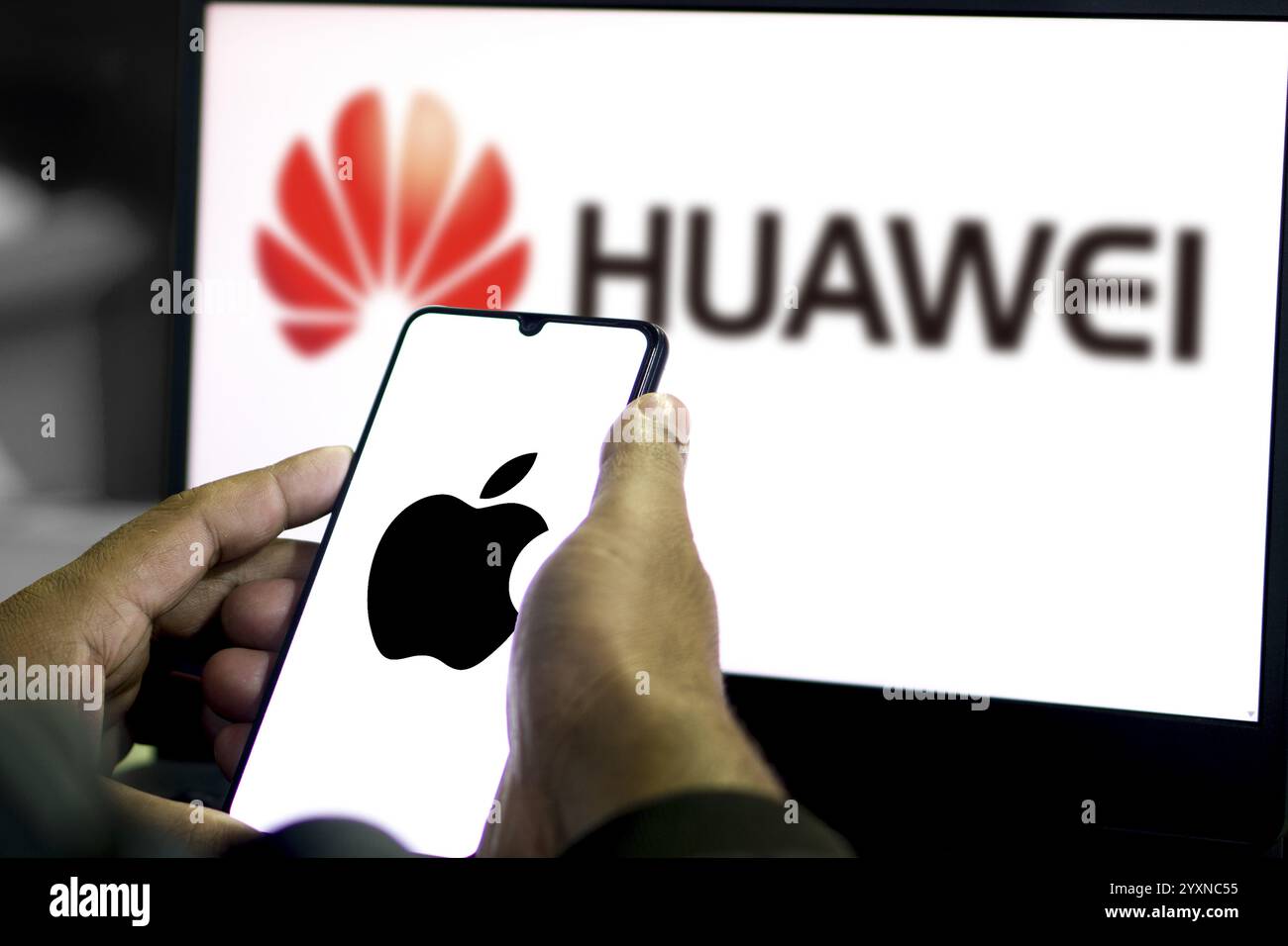 Huawei vs Apple logo on a smartphone Stock Photo - Alamy