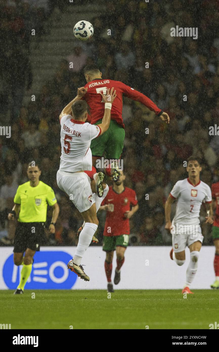 Football match, captain Cristiano RONALDO CR7 Portugal in red heading a ...