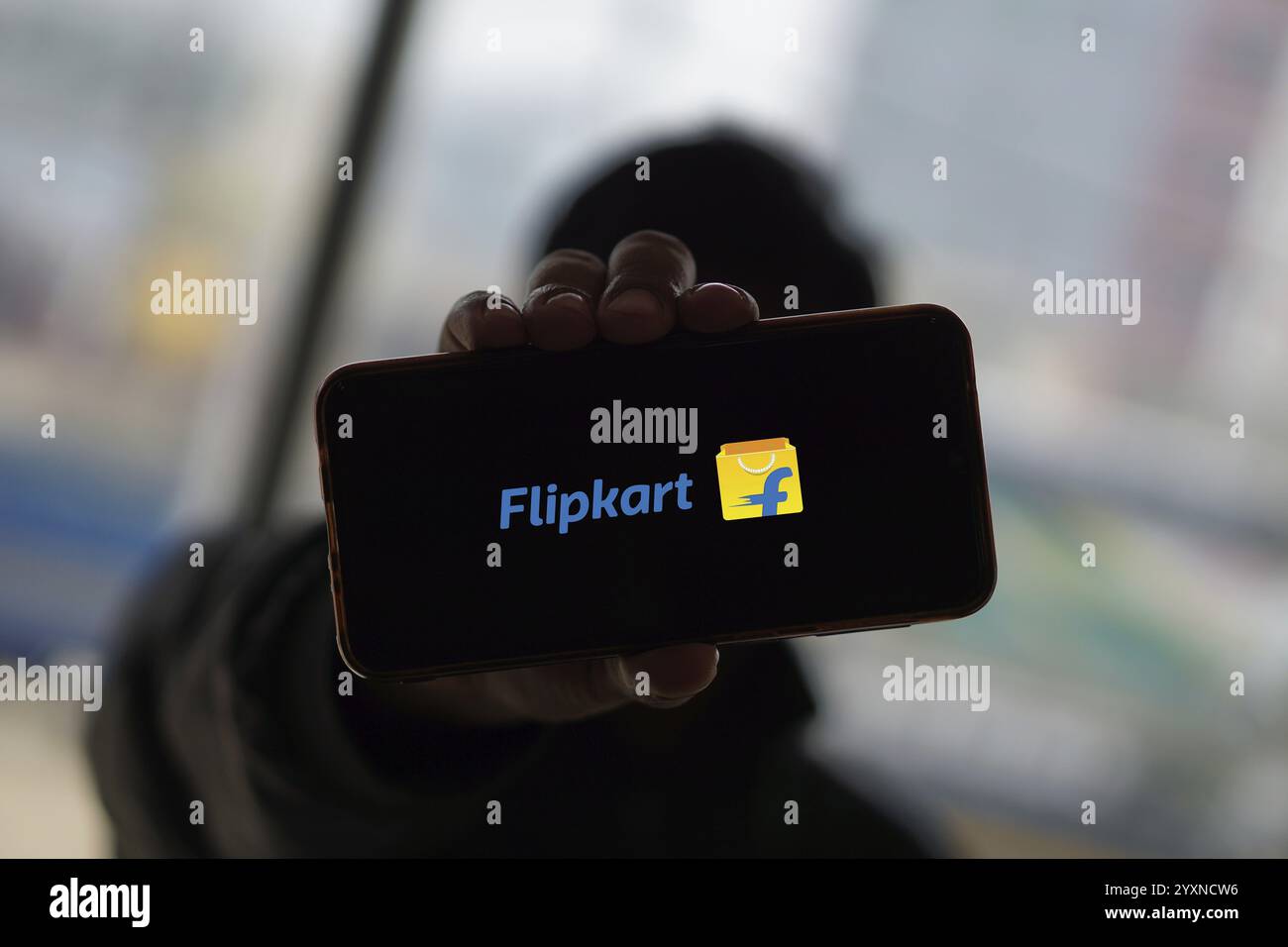 Flipkart application on smartphone with laptop background Stock Photo ...