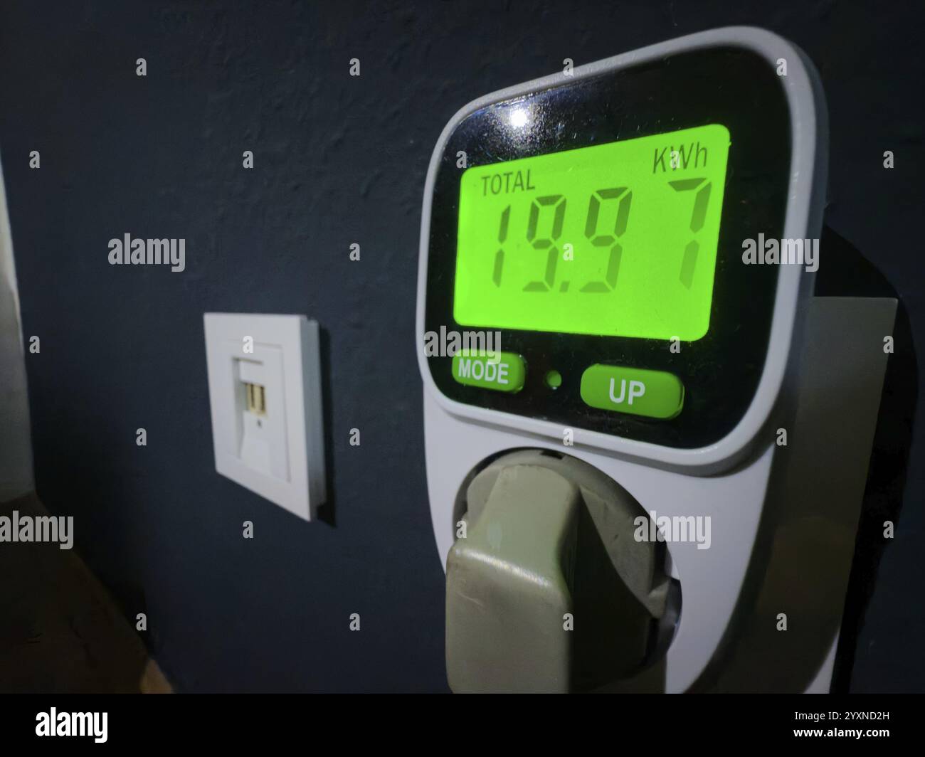 Measuring device for power consumption with display Stock Photo - Alamy