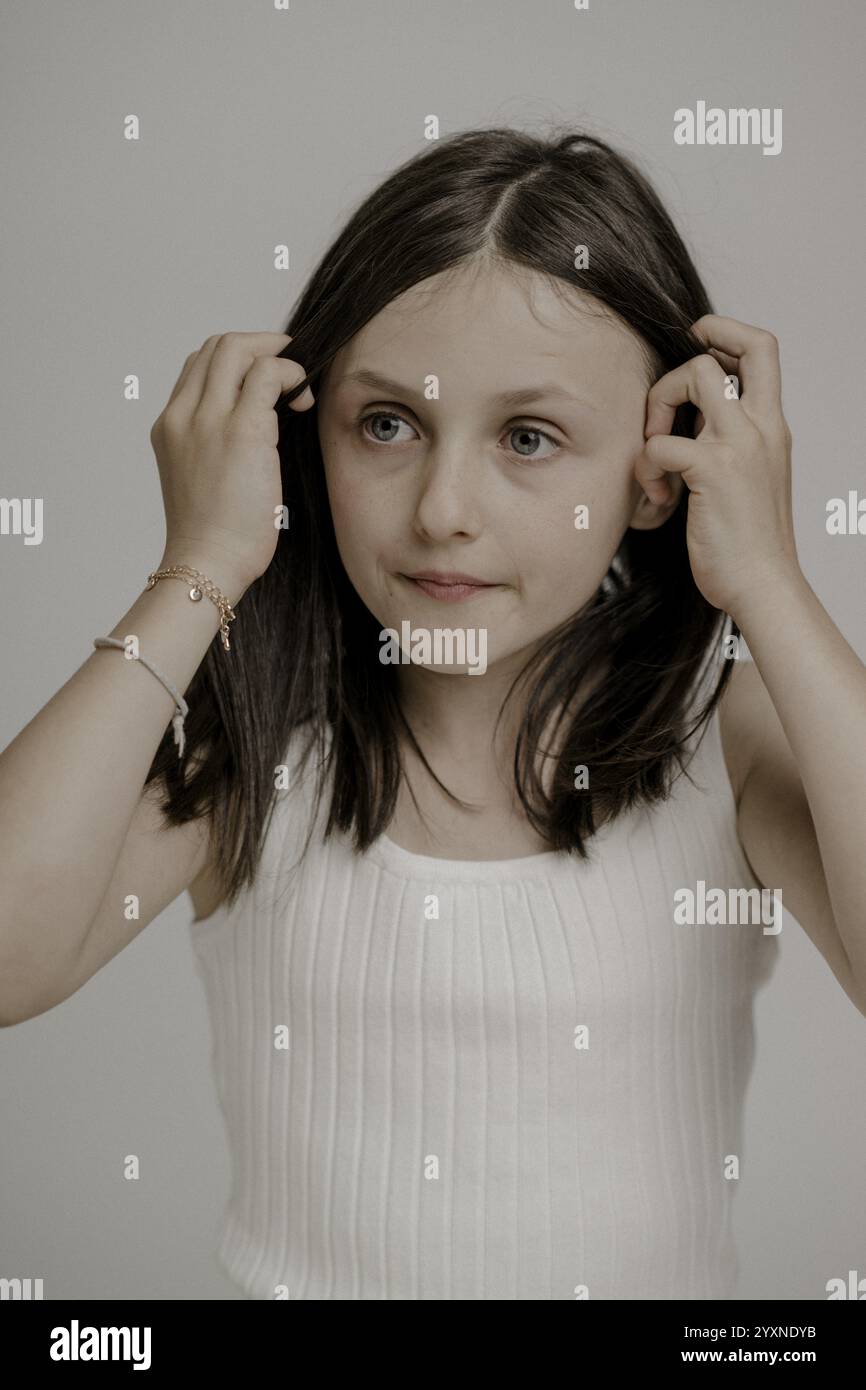 Dark-haired girl, 10, in portrait Stock Photo - Alamy