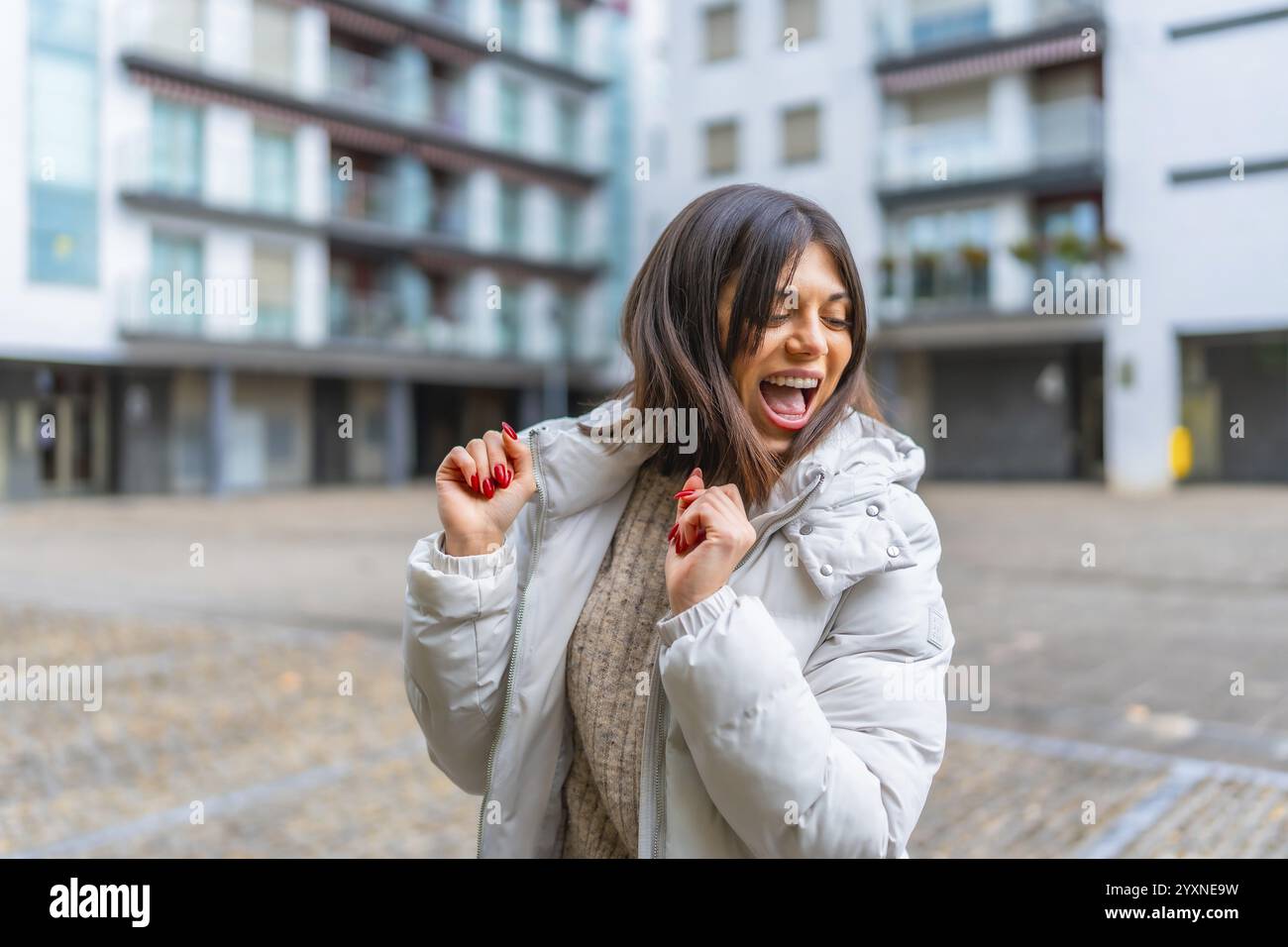 Happy hispanic woman dancing american hi-res stock photography and ...