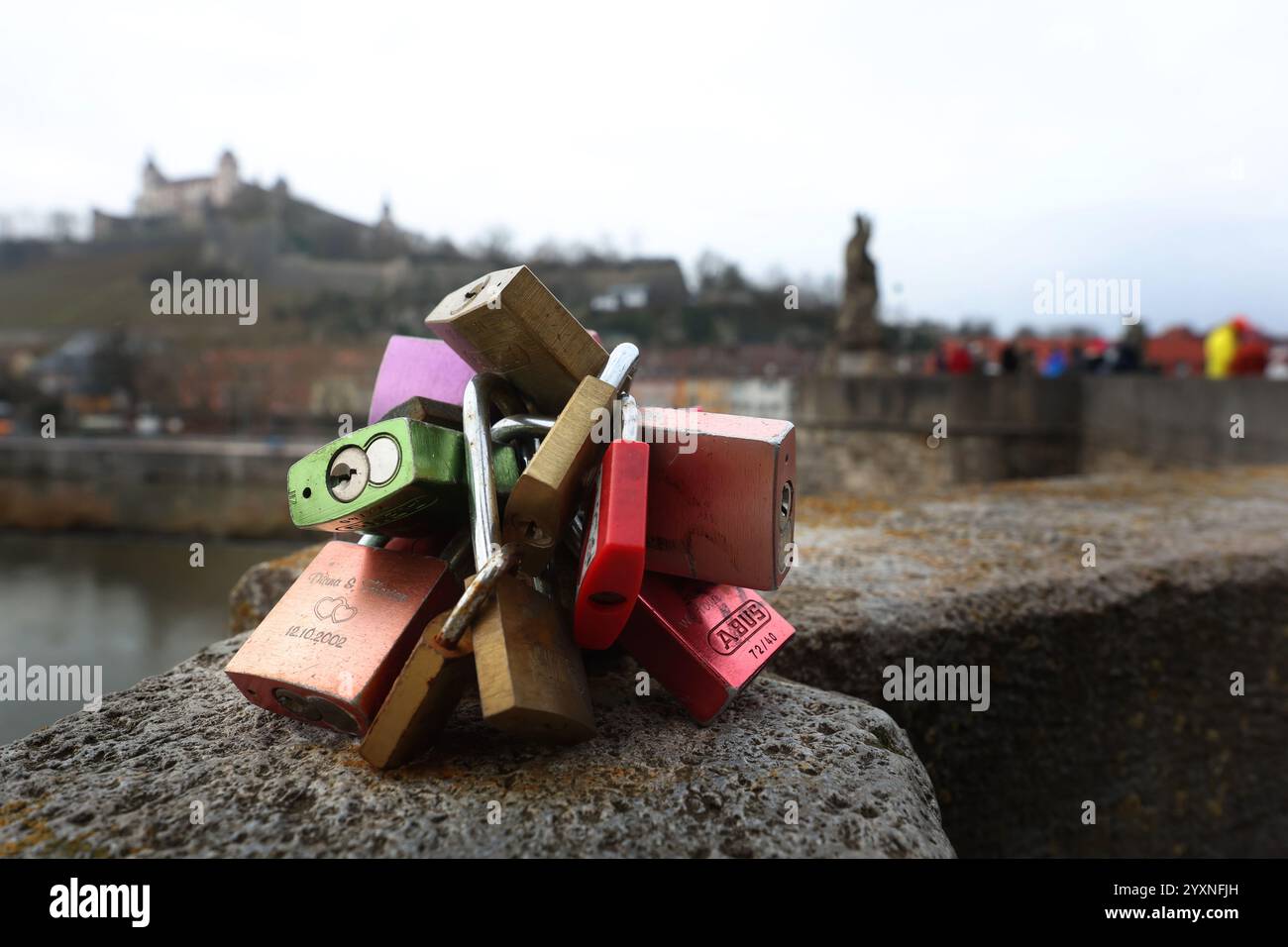 PRODUCTION - 15 December 2024, Bavaria, Würzburg: "Love locks" are ...