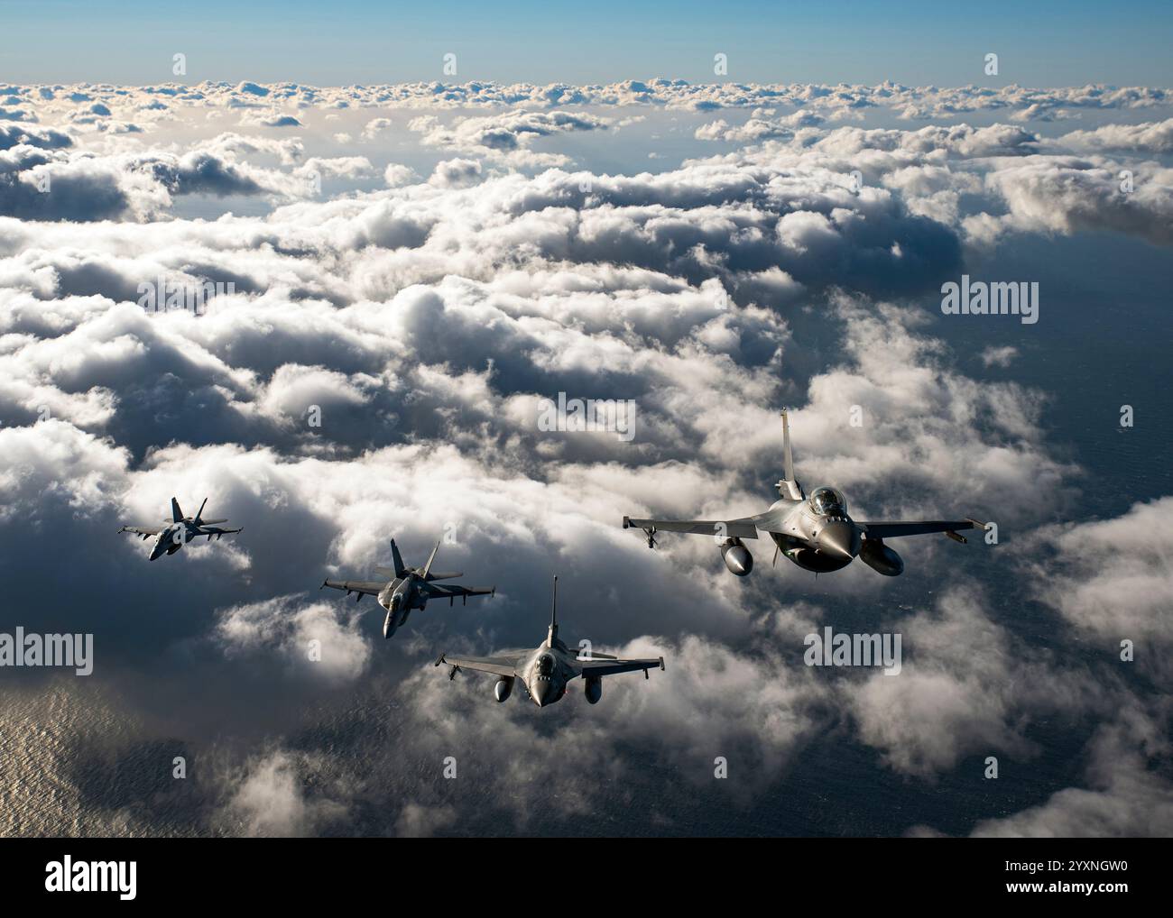 F/A-18 Super Hornets of the U.S. Navy and Hellenic Air Force F-16's fly ...