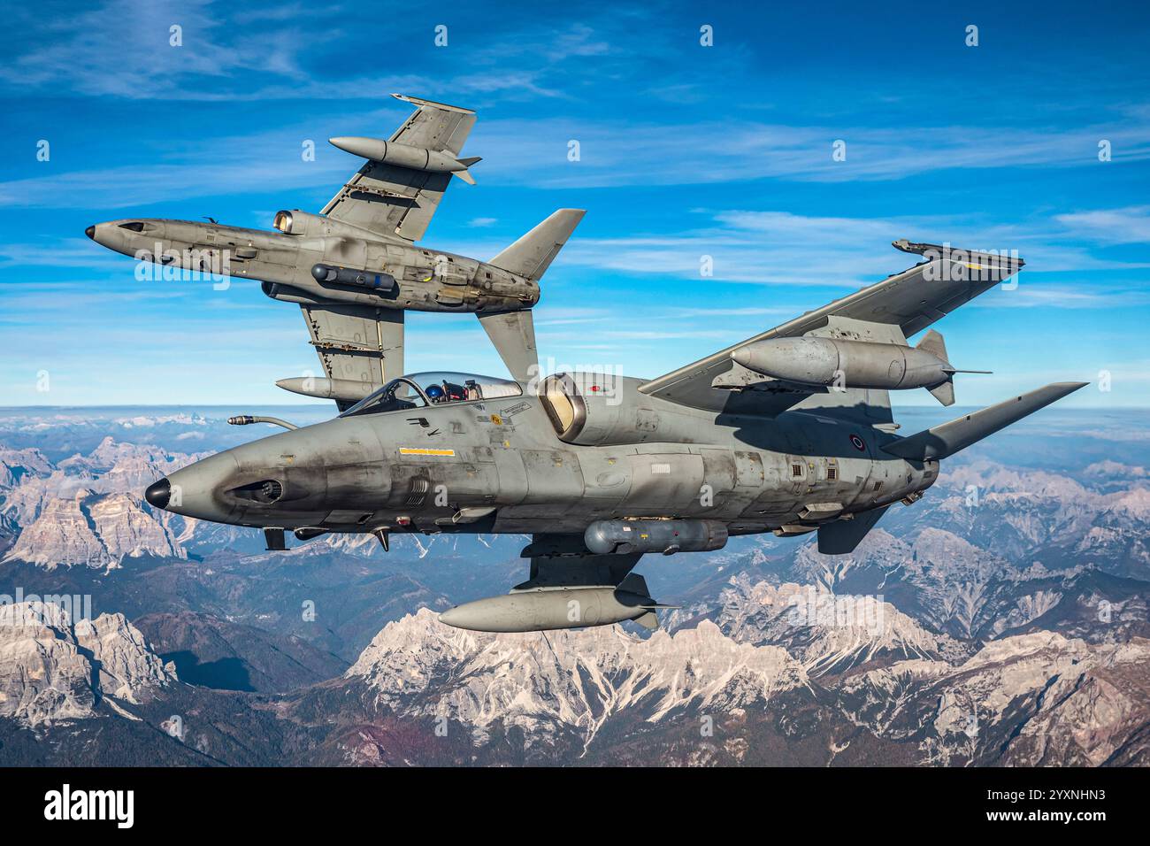 A pair of Italian Air Force AMX Ghibli aircraft in flight over the ...