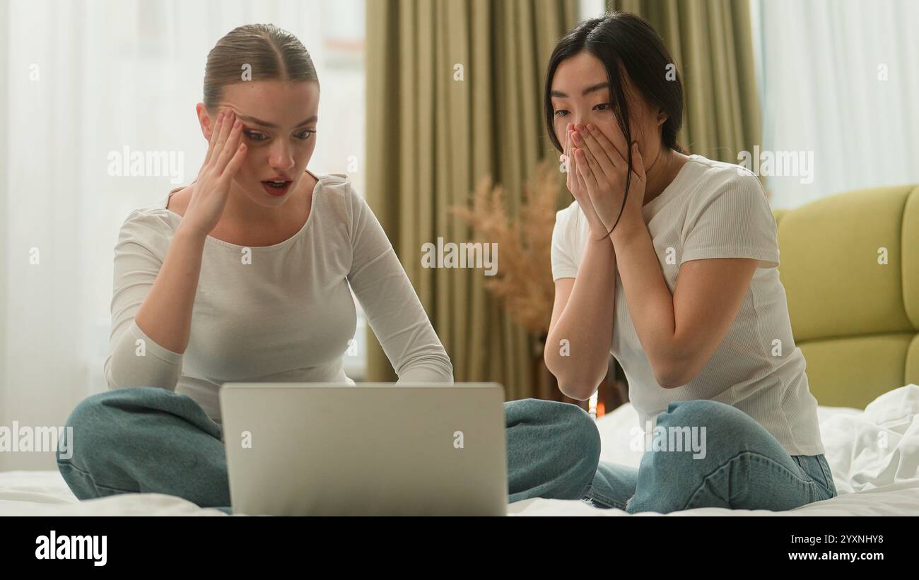 Two multiracial women upset frustrated sad worried friends female ...