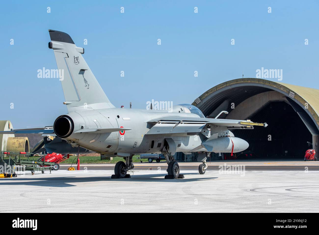An Italian Air Force AMX Ghibli parked in front of a shelter at Istrana ...