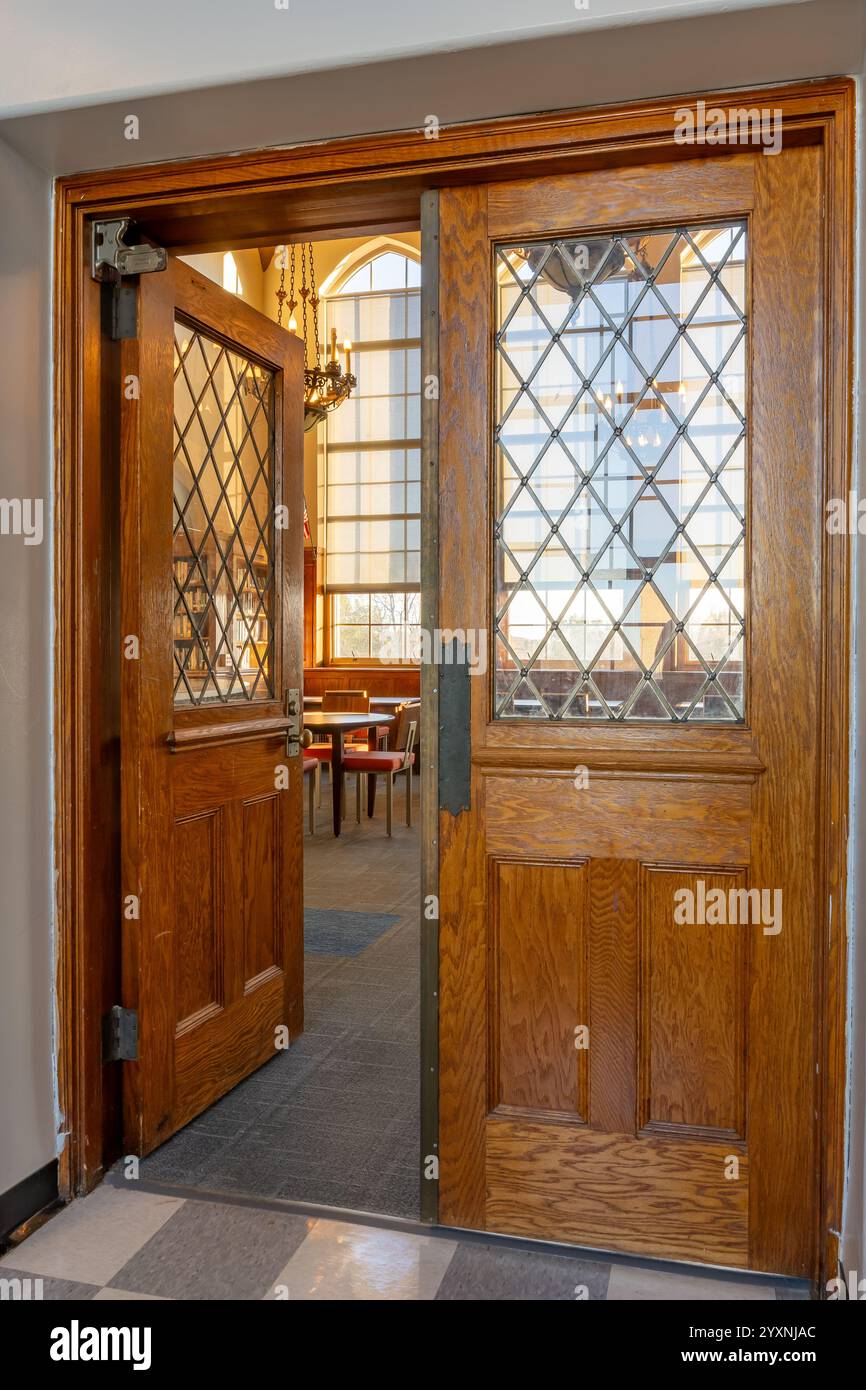 Interior entrance into a old public library. Old wooden interior doors ...