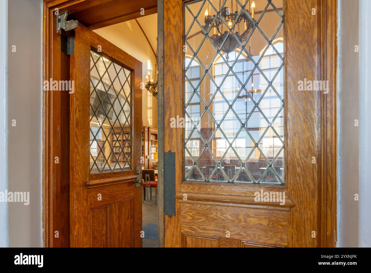 Interior entrance into a old public library. Old wooden interior doors ...