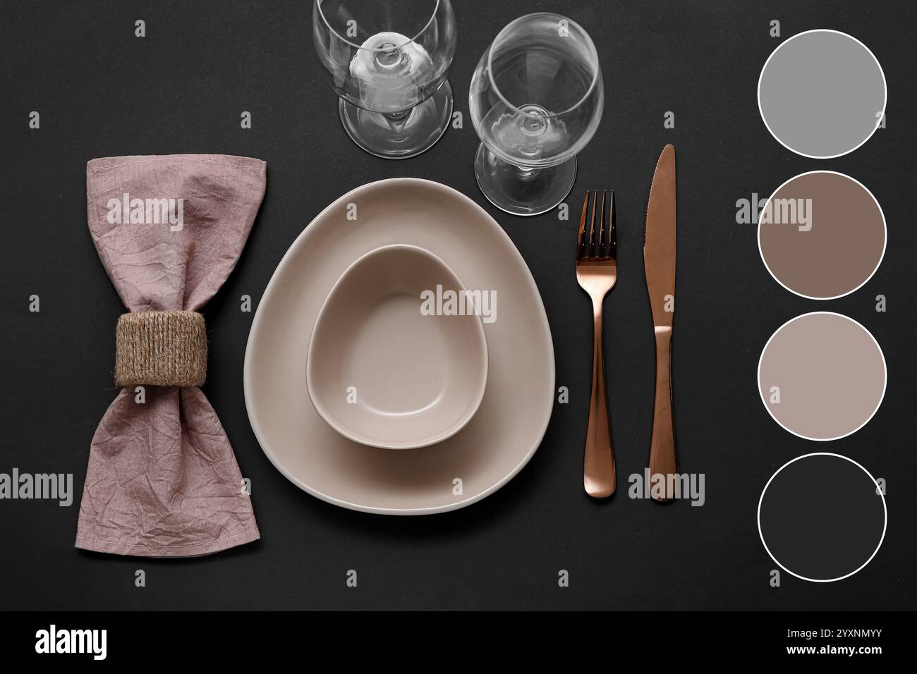 Elegant table setting on dark background. Different color patterns ...