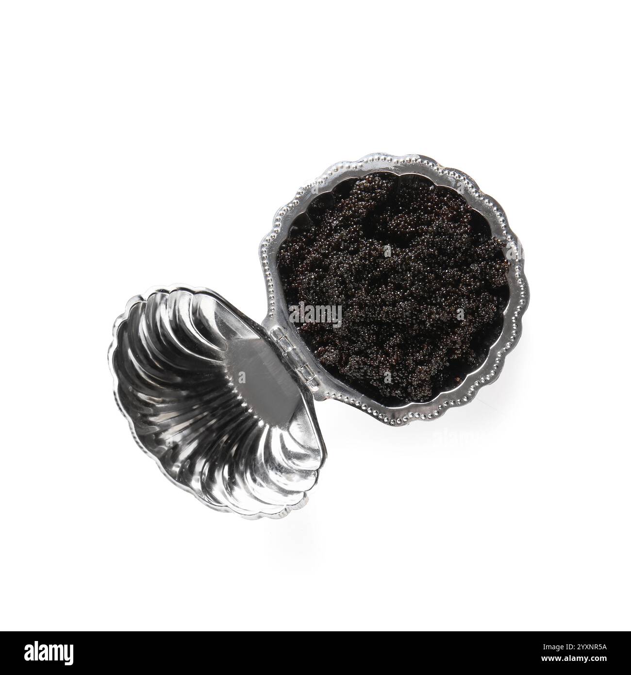 Seashell shaped dish with delicious black caviar on white background ...