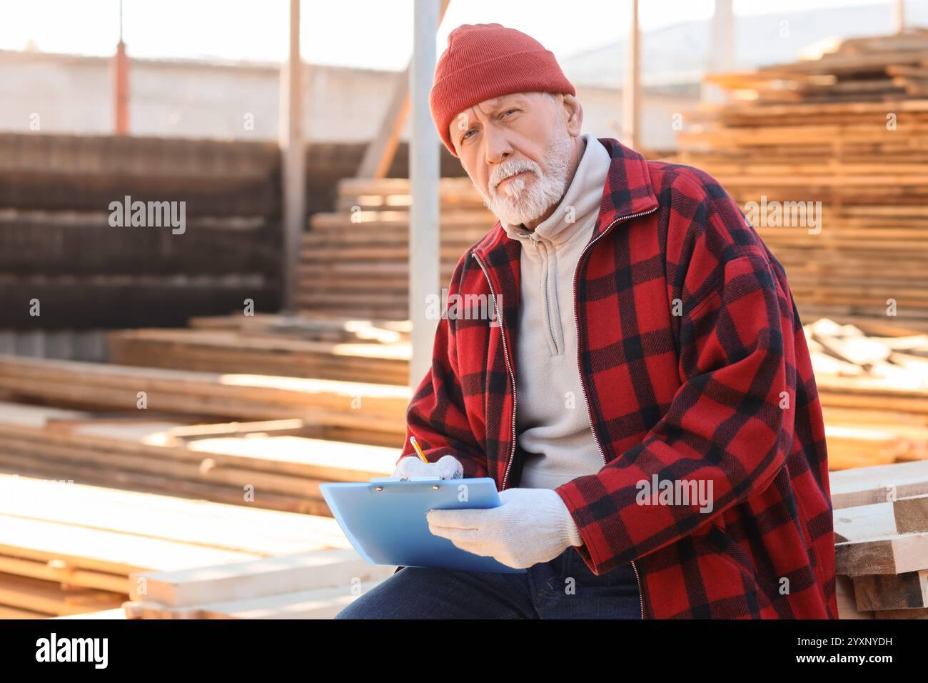 Mature male carpenter writing hi-res stock photography and images - Alamy