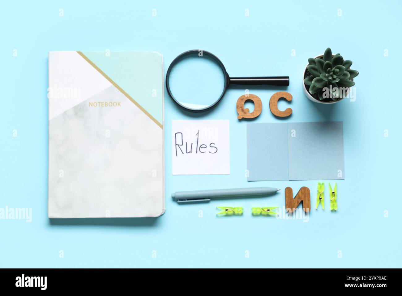 Paper with word RULES and stationery on blue background Stock Photo - Alamy