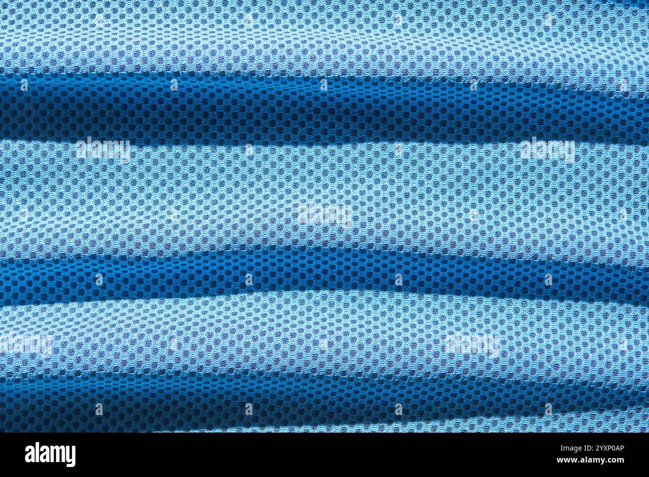 Abstract blue and white striped pattern with texture detail in close up ...