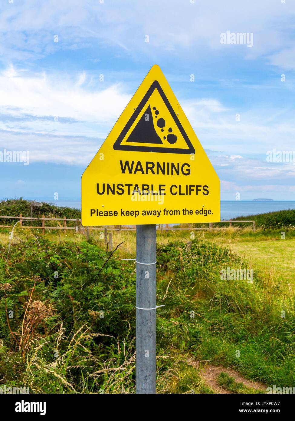 Warning sign next to cliffs near Kilve in north Somerset England UK ...