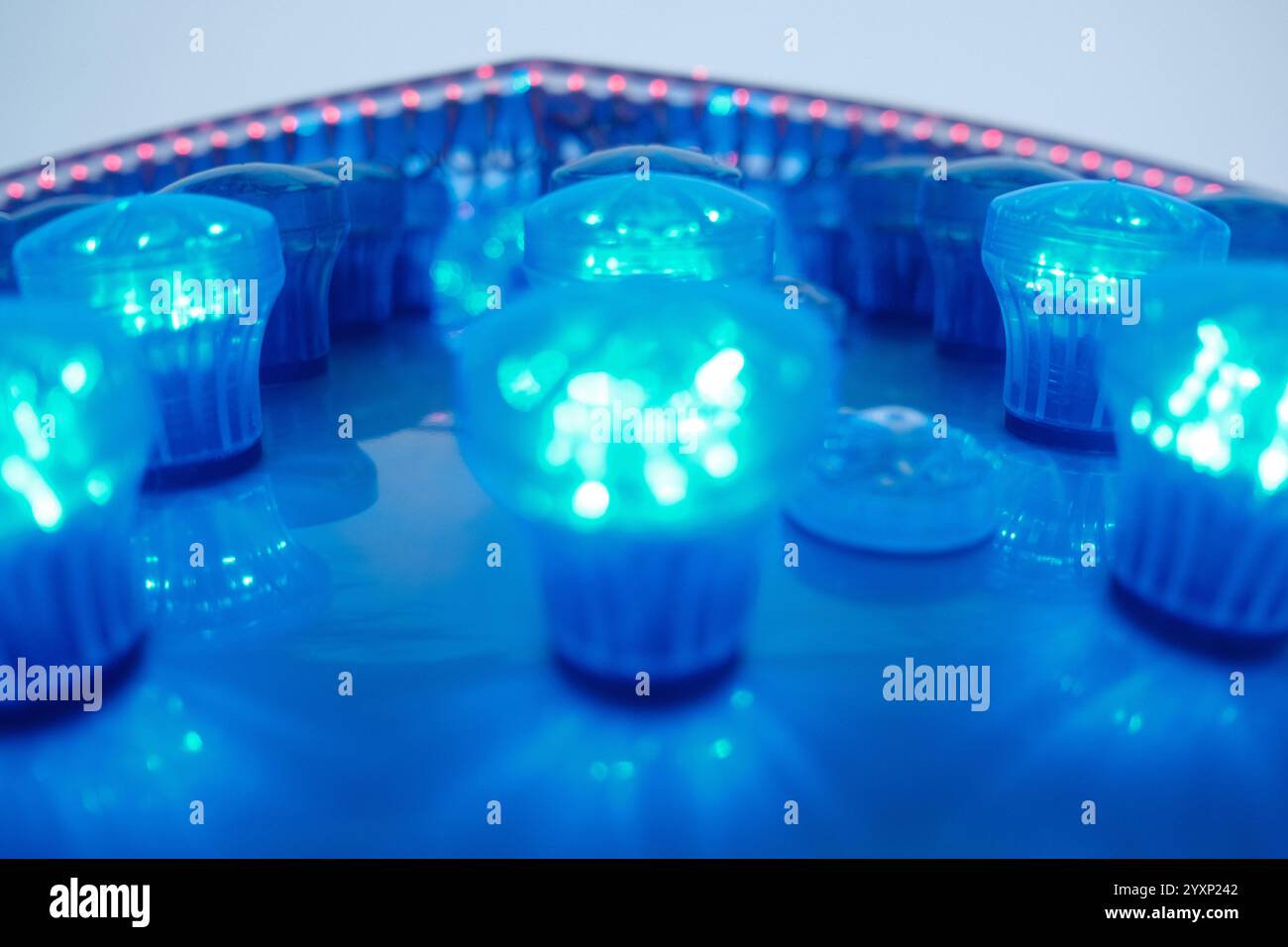 A blue lighted sign with a blue background. The lights are lit up and ...