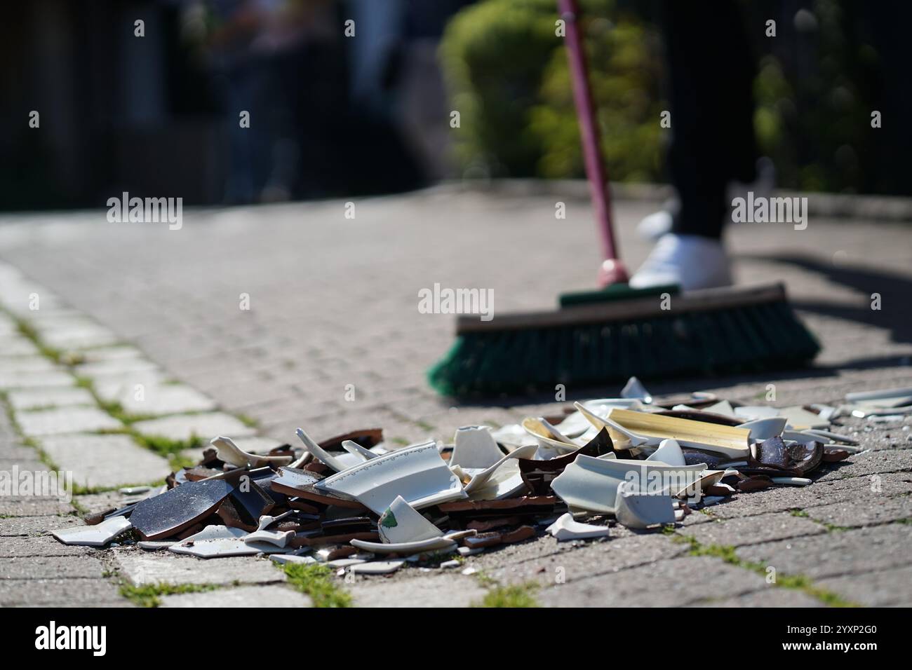 Broom on pavement hi-res stock photography and images - Alamy