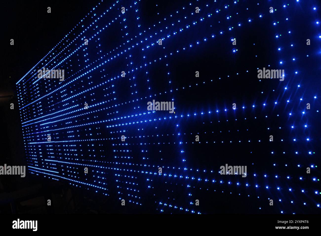 A blue screen with a pattern of dots and lines. The blue screen is lit ...
