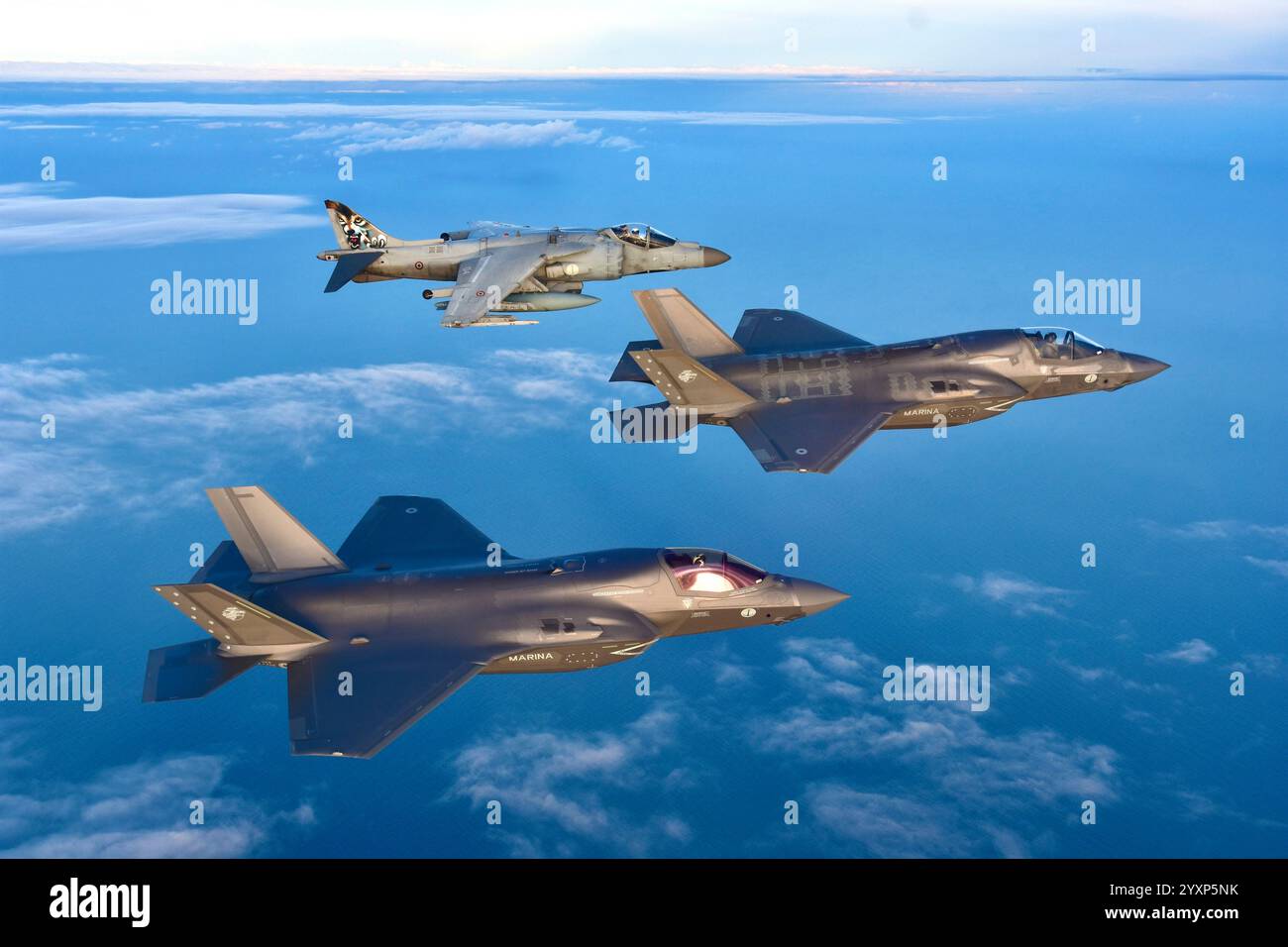 Italian Navy F-35B and AV-8B jets in formation over the Mediterranean ...